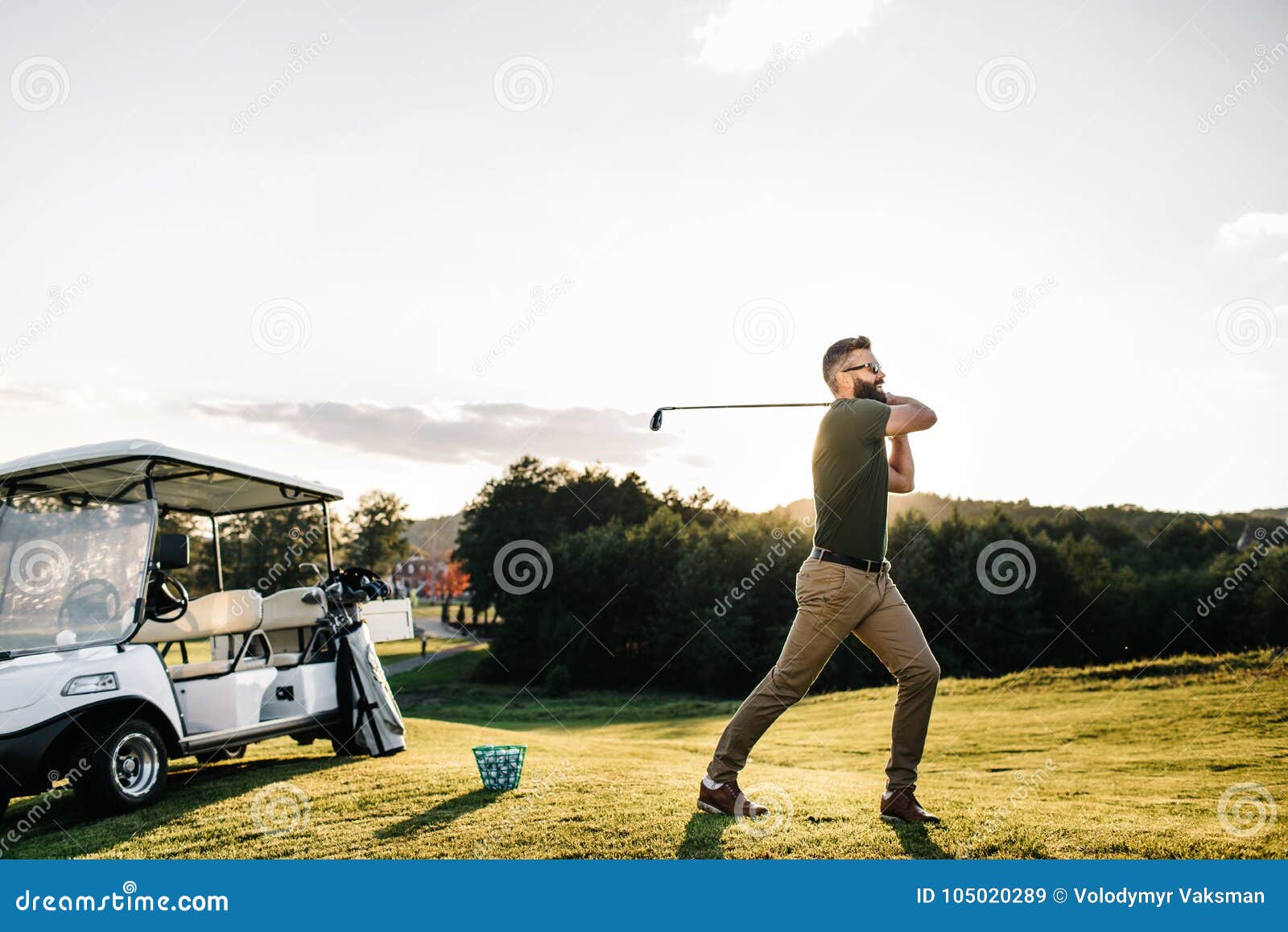 Golfers Hit Sweeping Golf Course in the Summer Stock Image - Image of ...