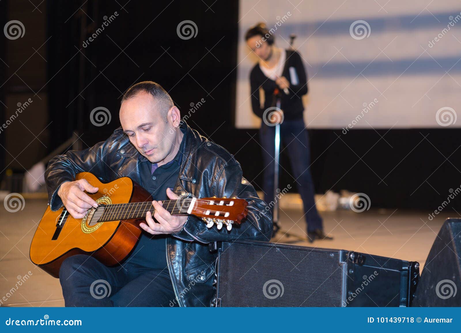 Man Playing Guitar on Stage Stock Photo - Image of metal, finger: 101439718