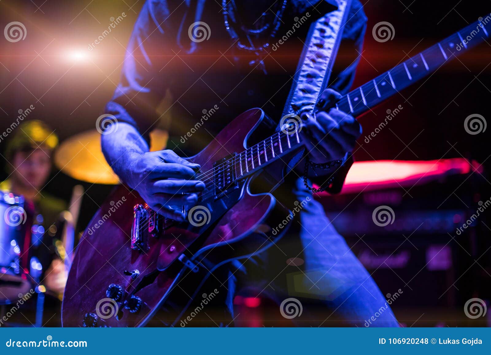 A Rocker is Playing Guitar on Stage. Stock Photo - Image of grunge ...