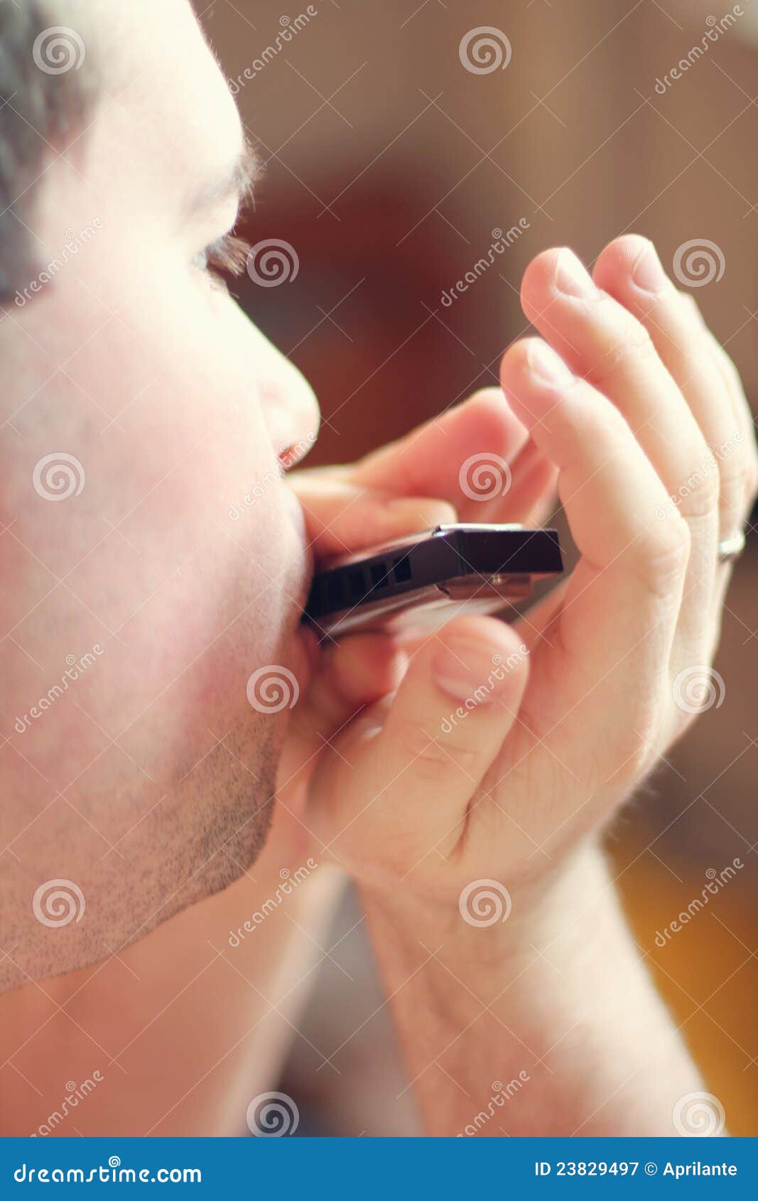 Man playing on harmonica stock image. Image of people - 23829497