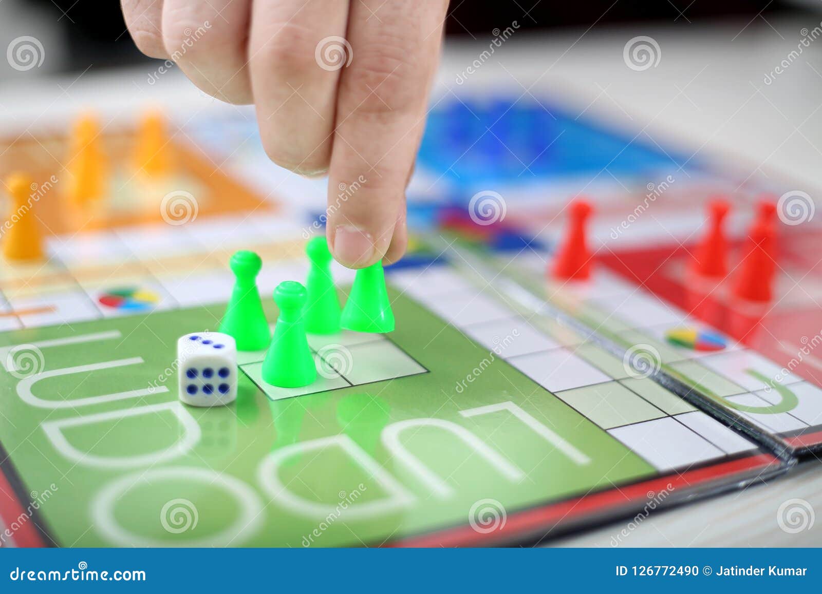 Man is playing ludo game editorial image. Image of lose - 126772490