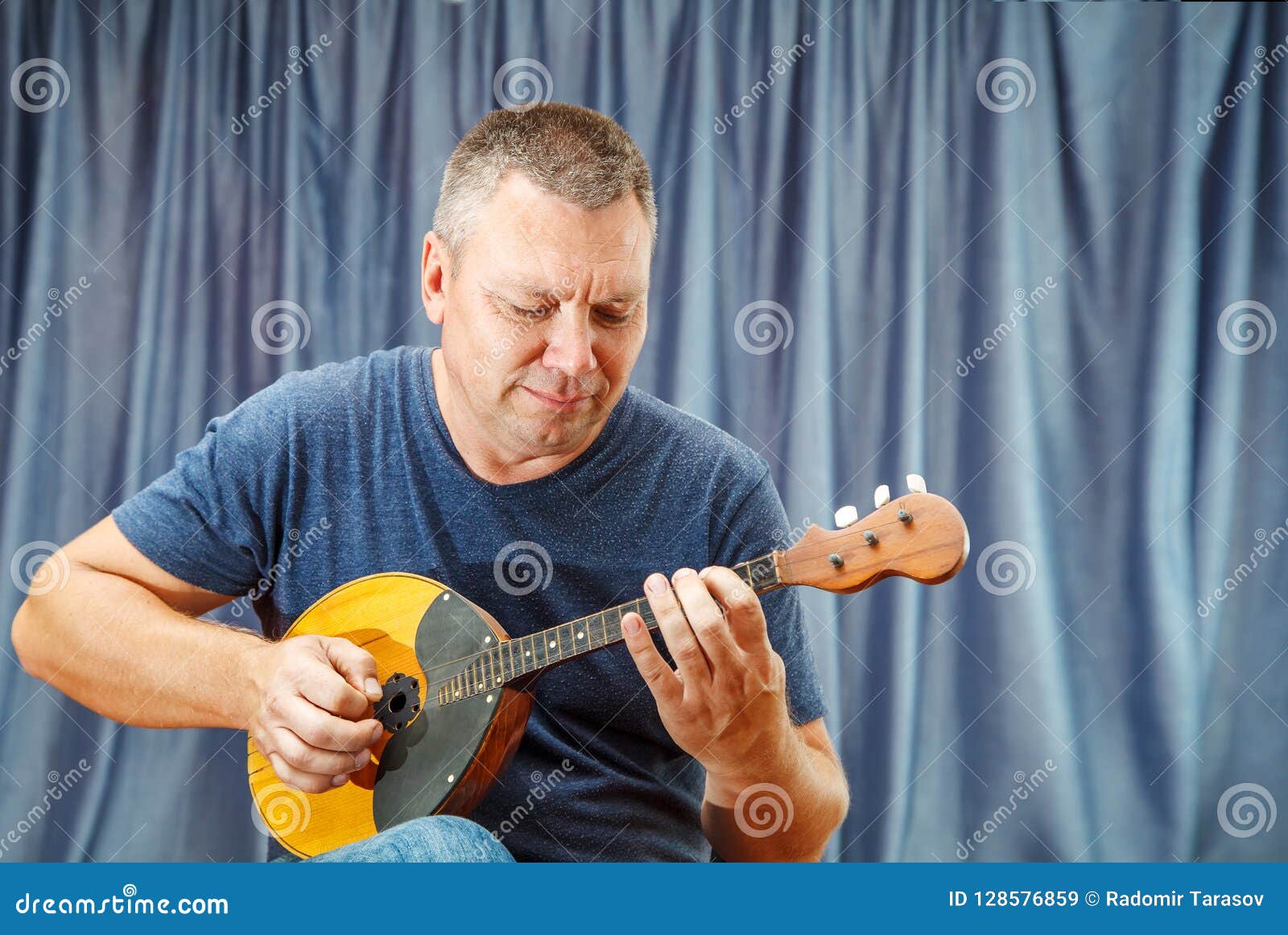 Man playing the mandolin stock image. Image of musicians - 128576859