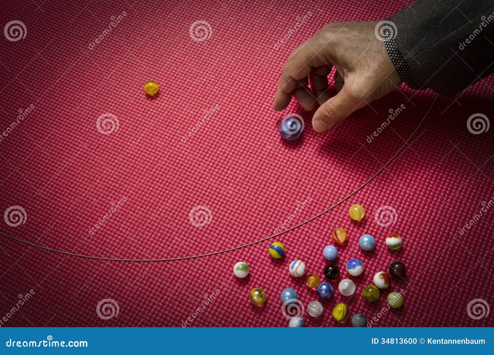 Man playing marbles stock photo. Image of business, businessman - 34813600