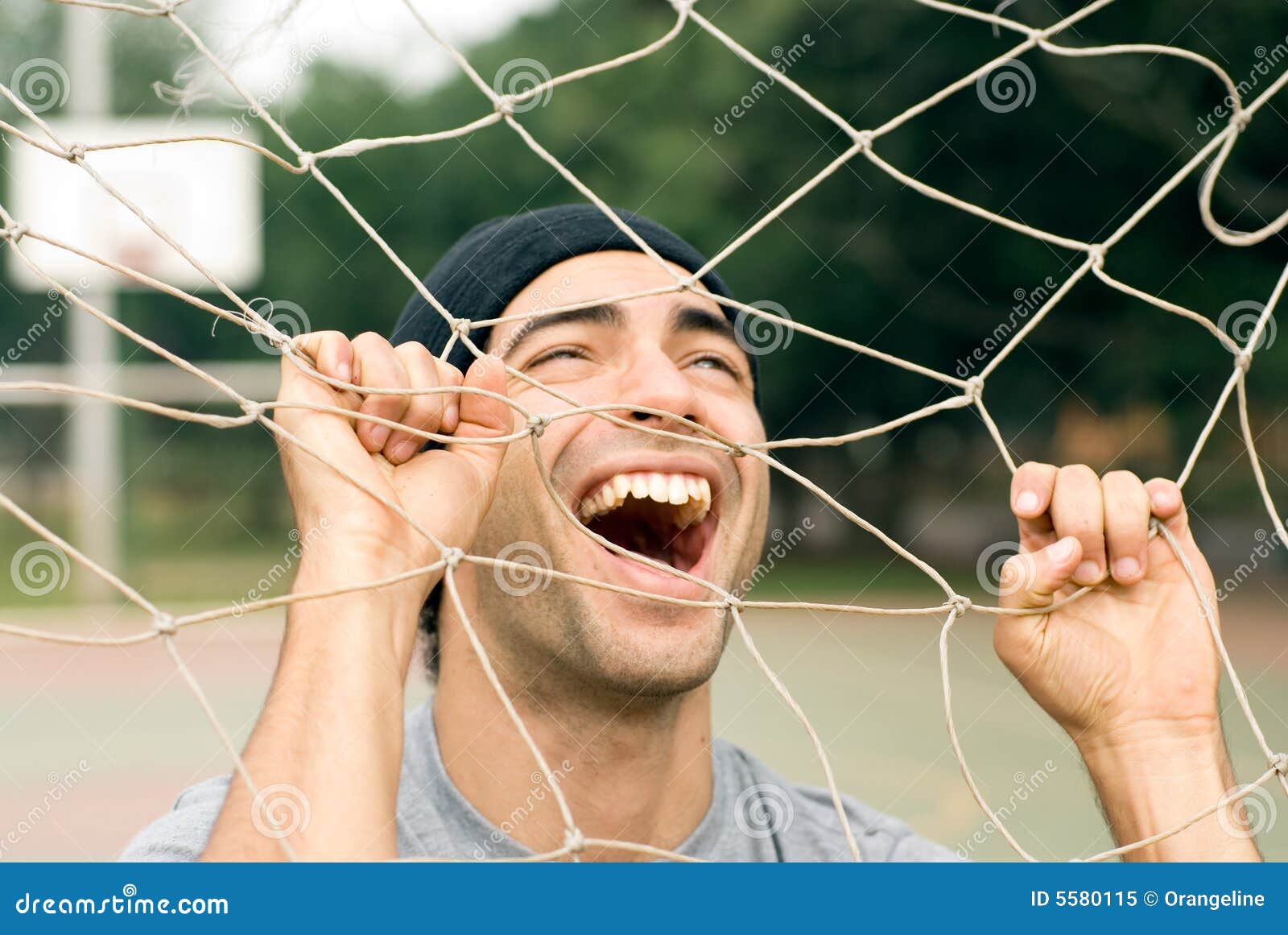 Man Playing with Net - Horizontal Stock Image - Image of happy ...