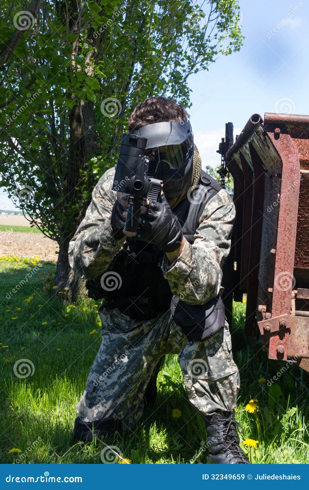 Man playing paintball stock image. Image of hitting, outdoor - 32349659