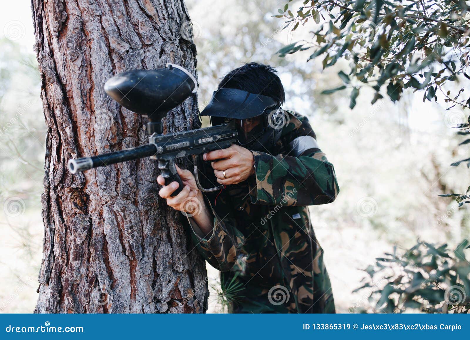 Man Playing Paintball in the Forest Editorial Stock Image - Image of ...