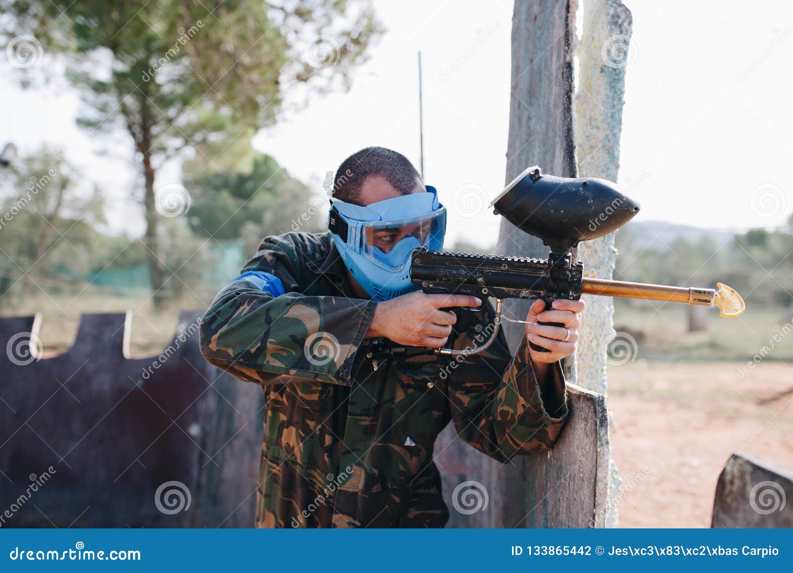 Man Playing Paintball in the Forest Editorial Photography - Image of ...