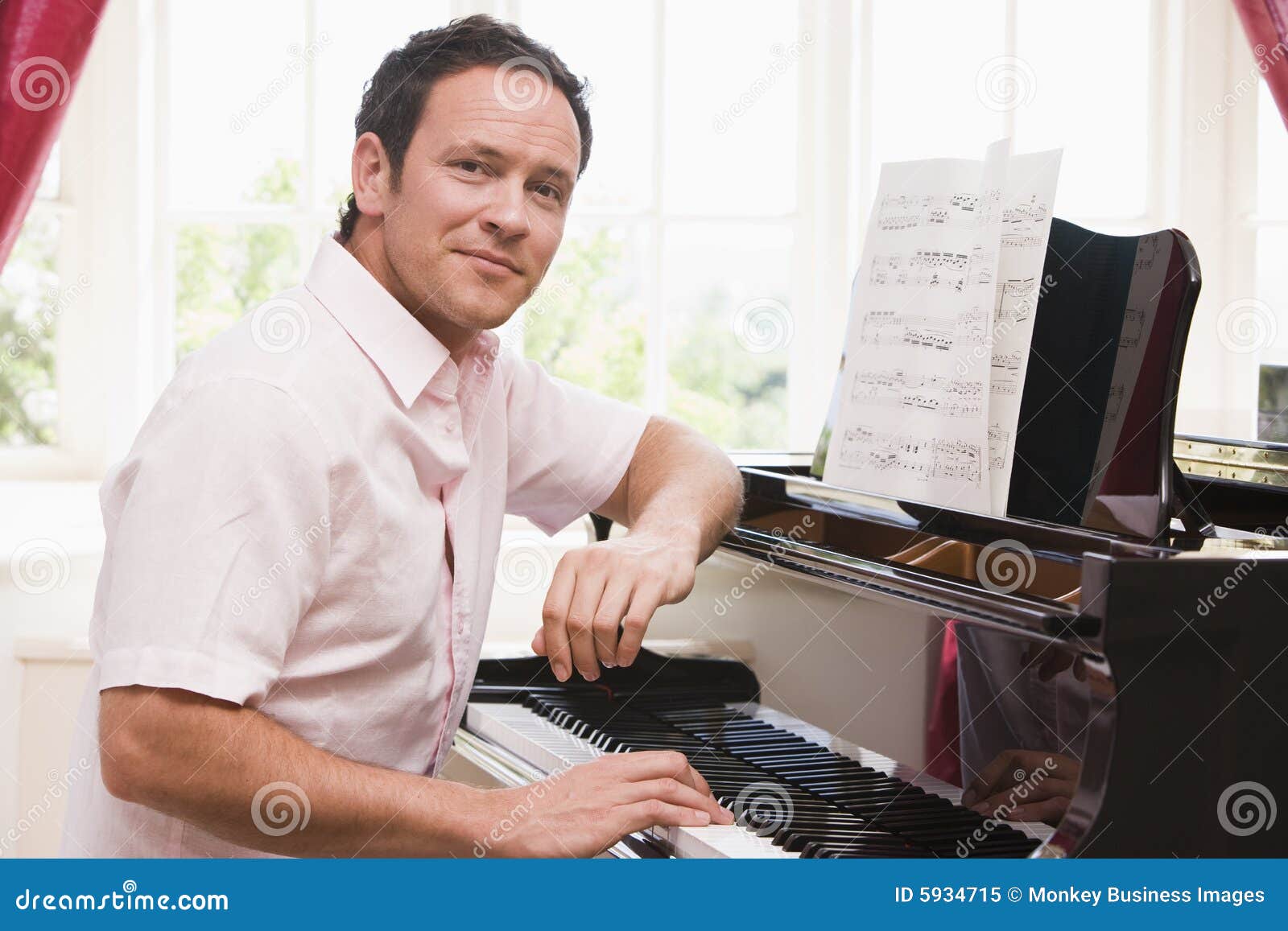 Man playing piano stock image. Image of lifestyle, living - 5934715