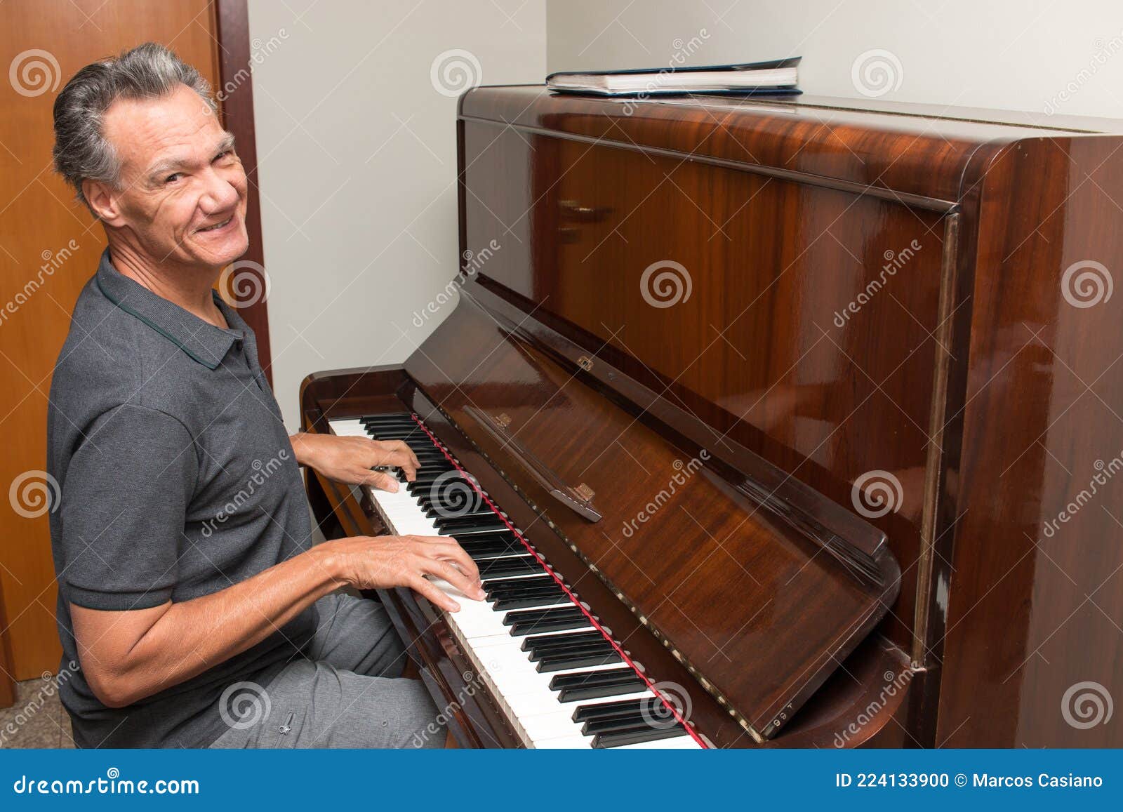 Man Playing Piano stock photo. Image of playing, hand - 224133900