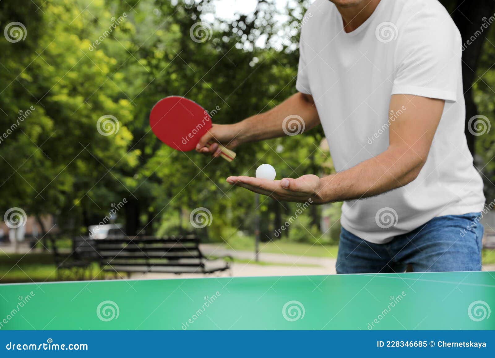 Man Playing Ping Pong in Park, Closeup Stock Image - Image of closeup ...