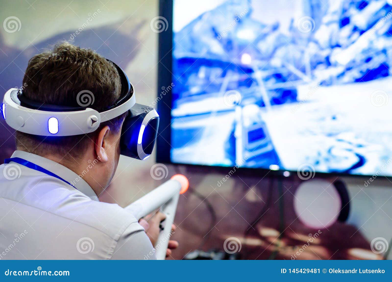Kyiv, Ukraine - April 12, 2019: Man Playing PlayStation VR with Aim ...