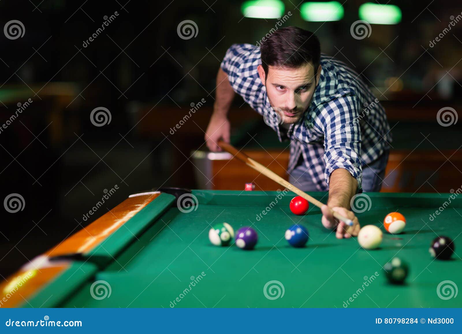 Man playing pool in pub stock photo. Image of game, active - 80798284
