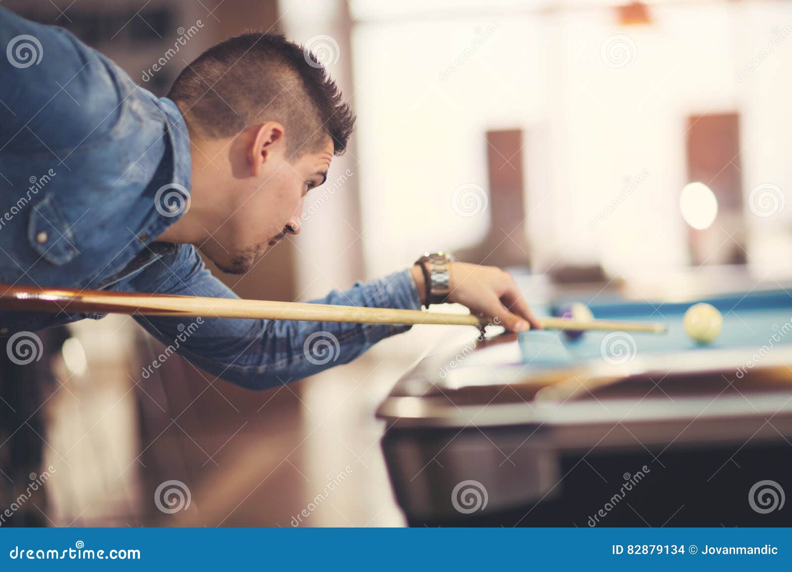 Man playing pool in pub stock photo. Image of billiard - 82879134
