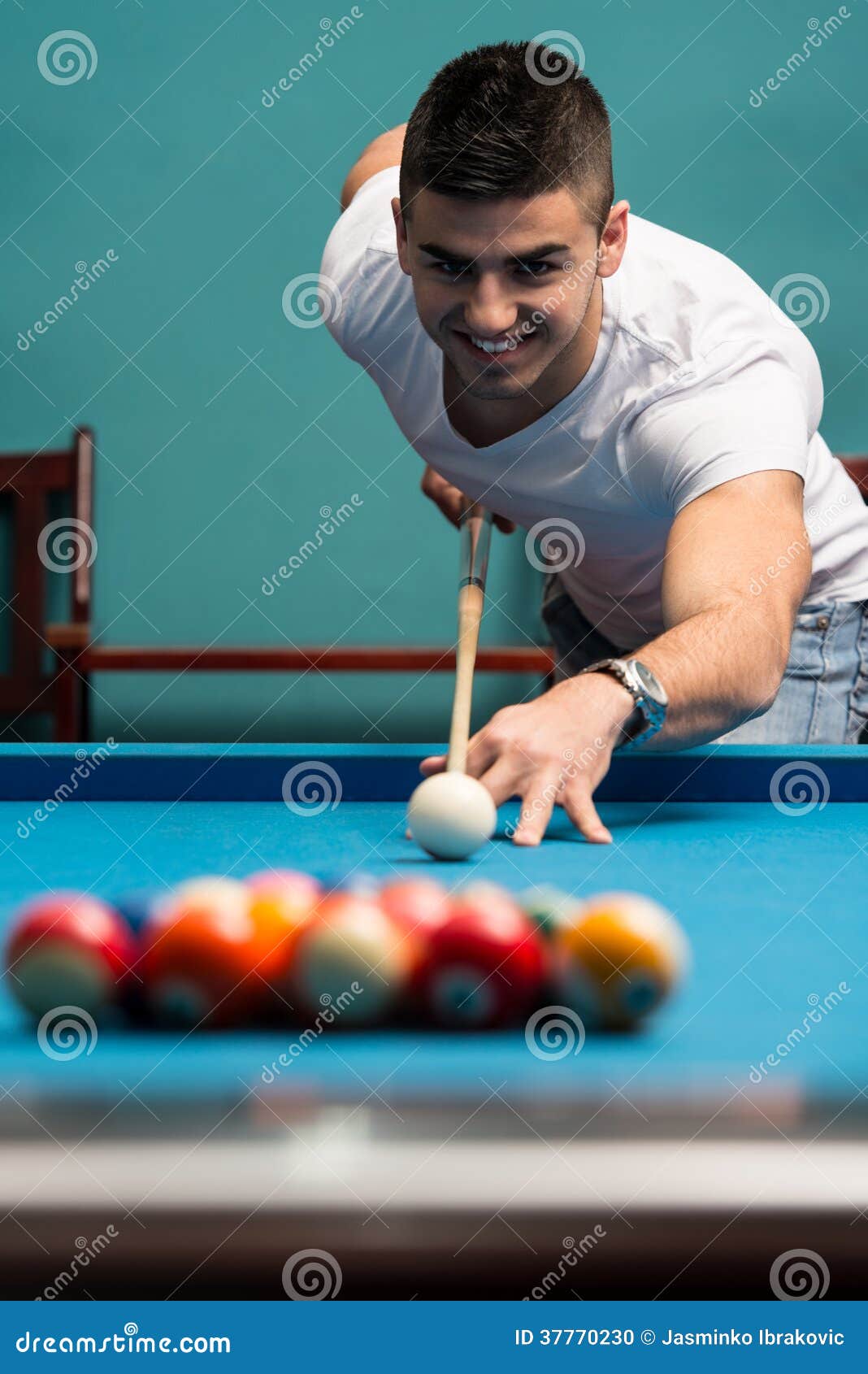 Man Playing Pool stock photo. Image of indoors, blue - 37770230