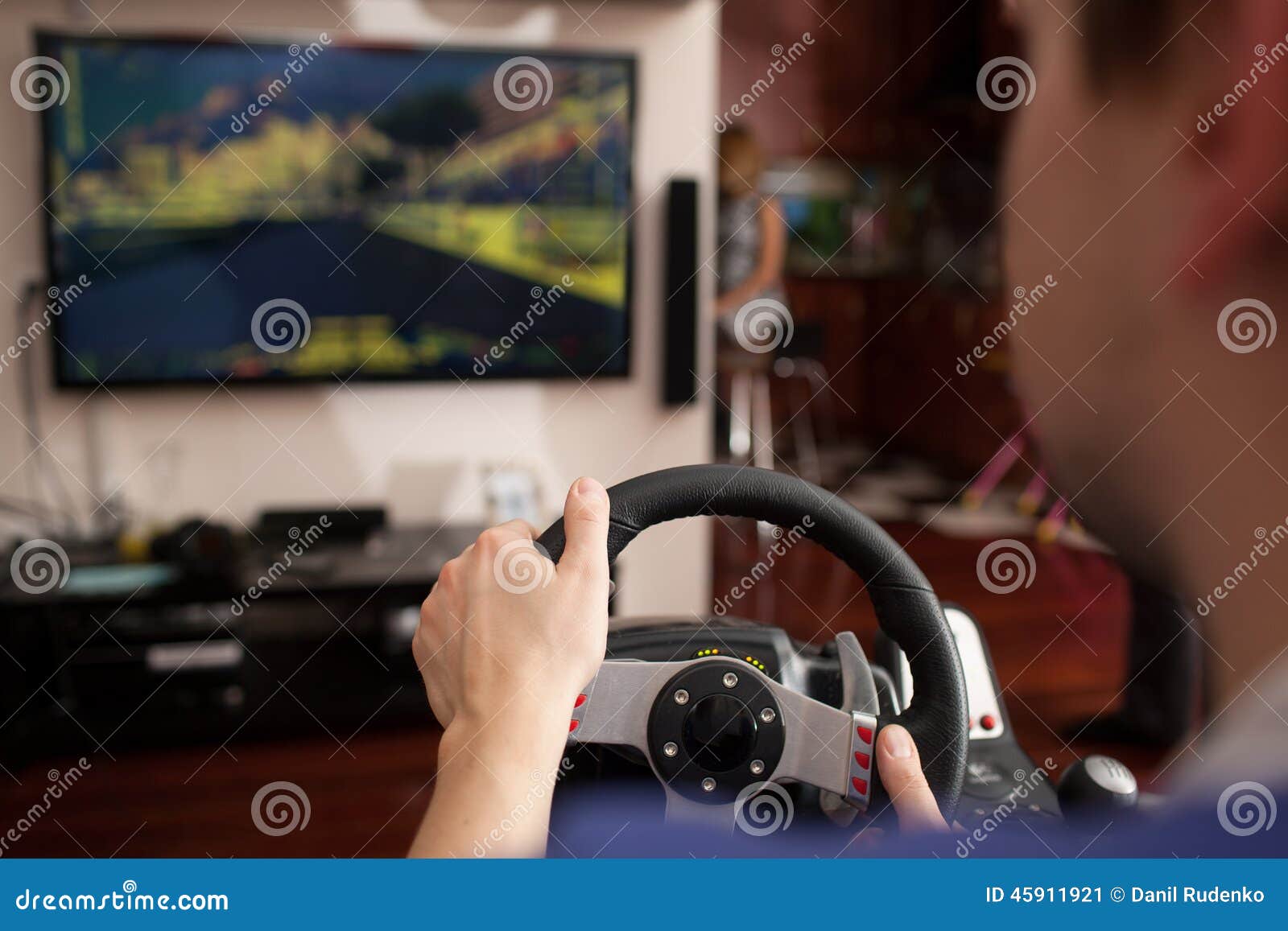 Man Playing Racing Game with Steering Wheel Stock Image - Image of game ...