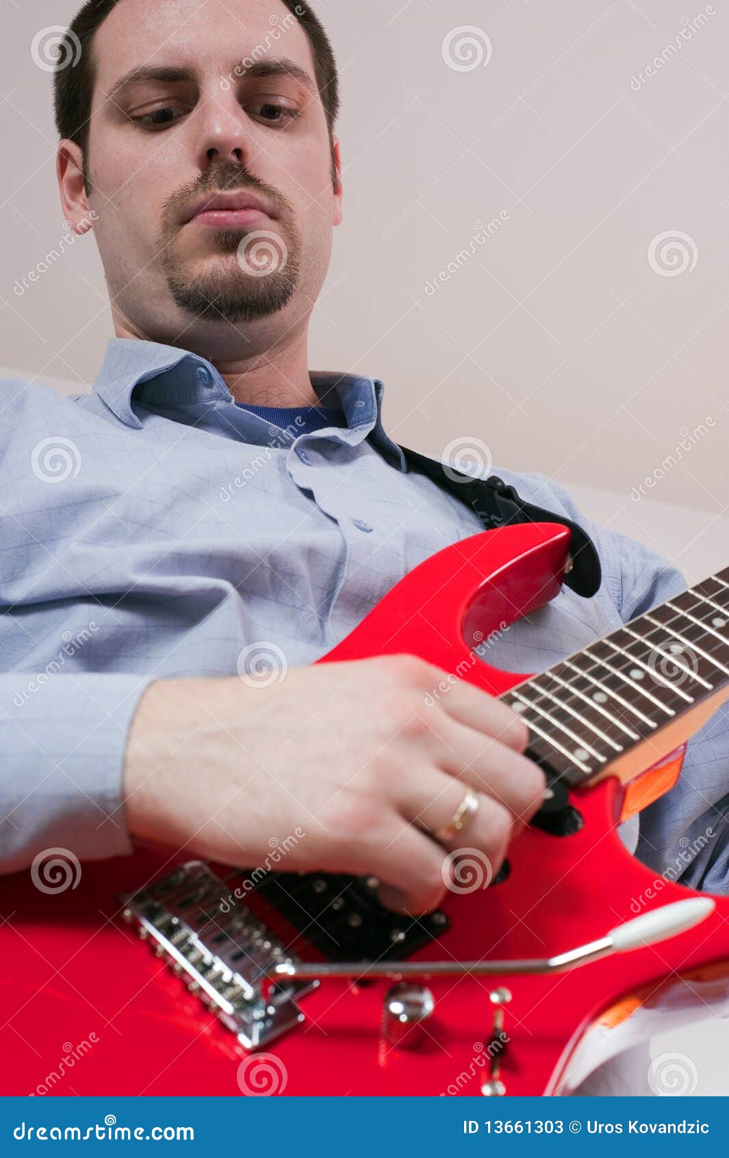 Man Playing a Red Electric Guitar Stock Image - Image of male ...