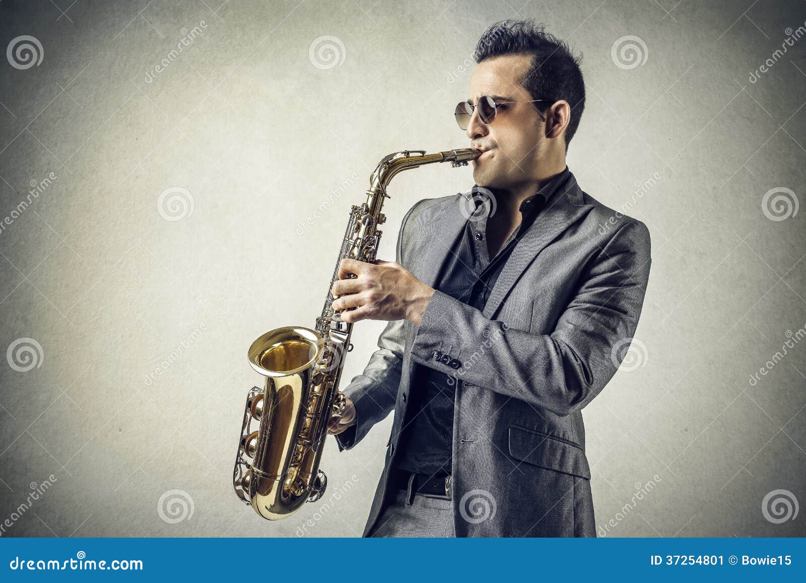 Man playing the sax stock image. Image of handsome, instrument - 37254801