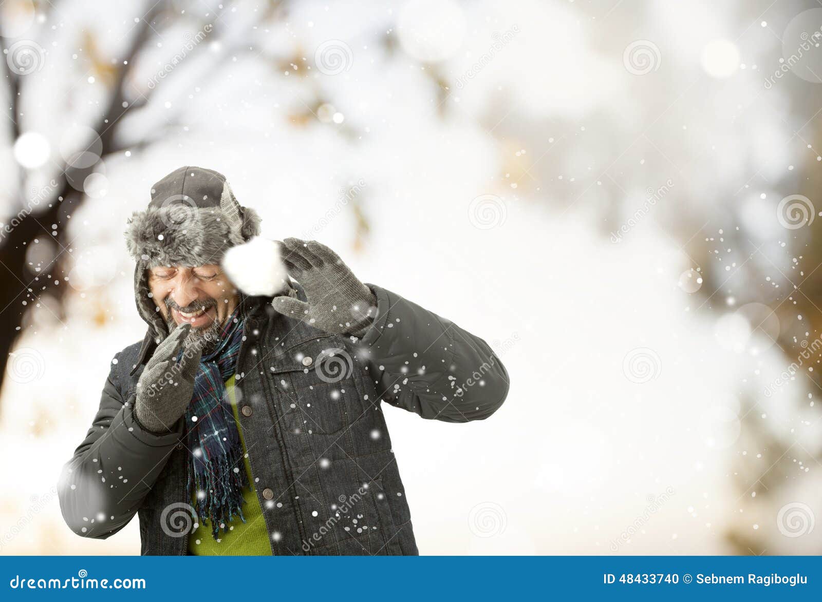 A man playing with snow stock photo. Image of portrait - 48433740