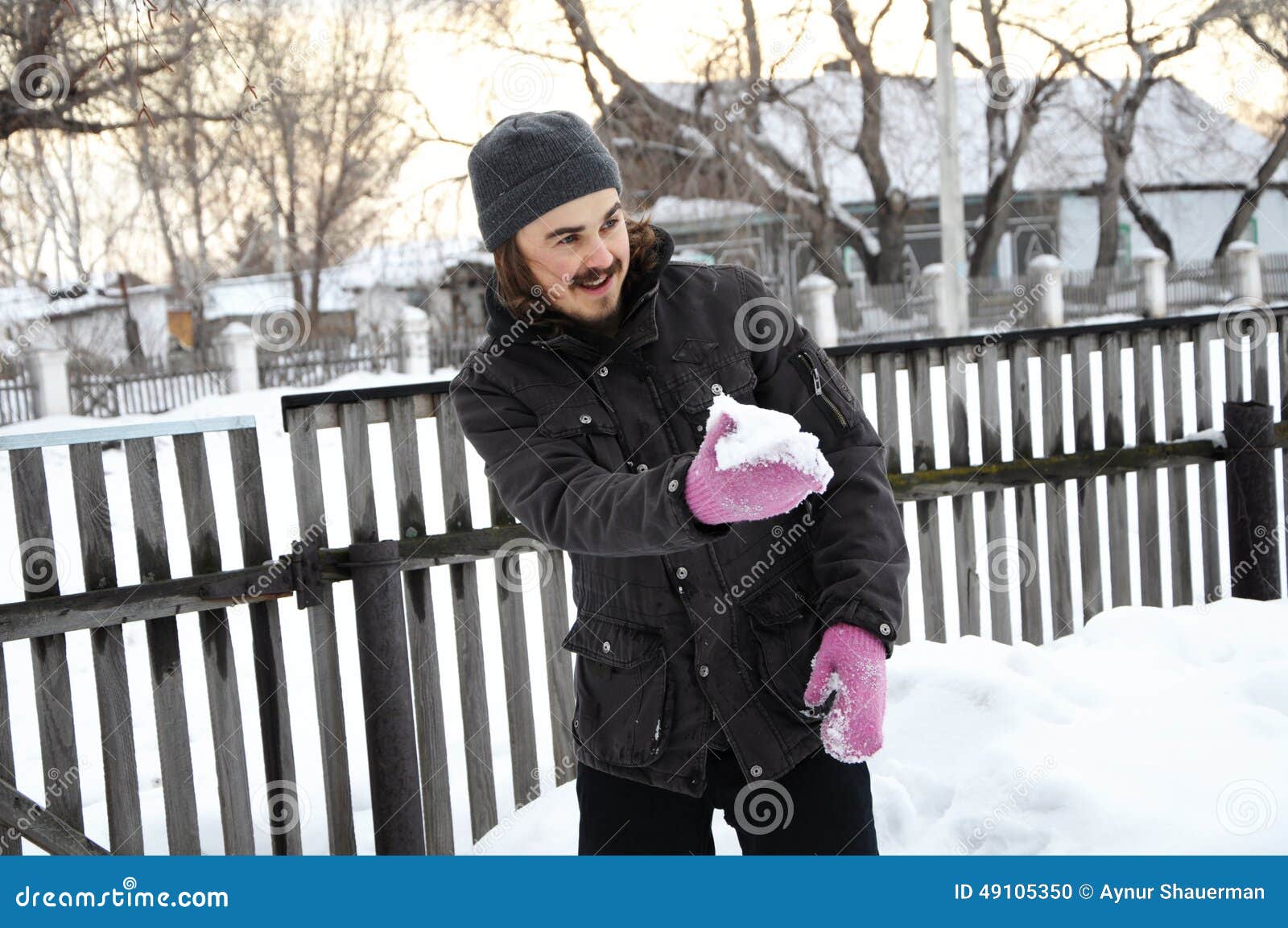 Man playing with snowball stock photo. Image of vacation - 49105350