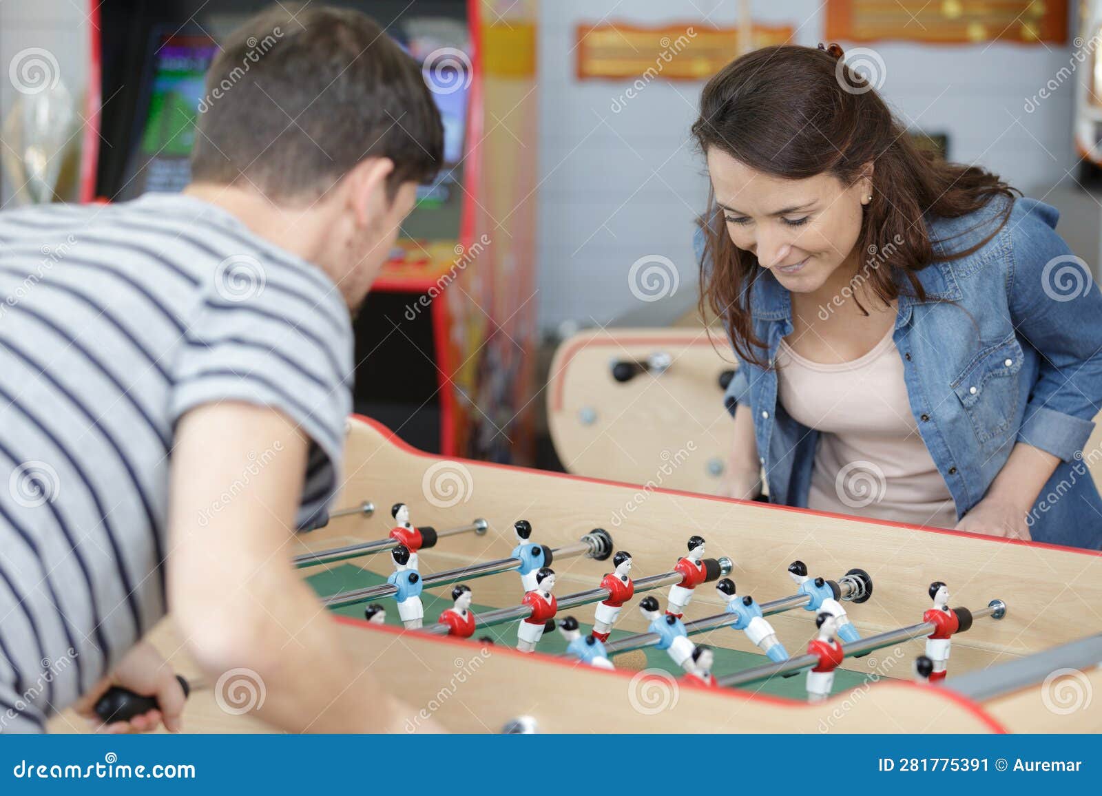 Man playing table football stock image. Image of couch - 281775391