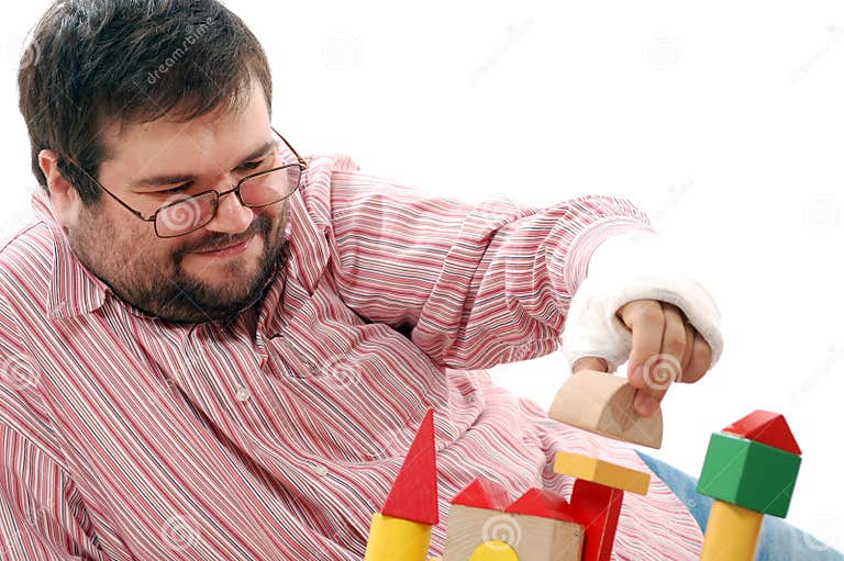Man Playing with Toy Bricks Stock Image - Image of hobby, adult: 12120001