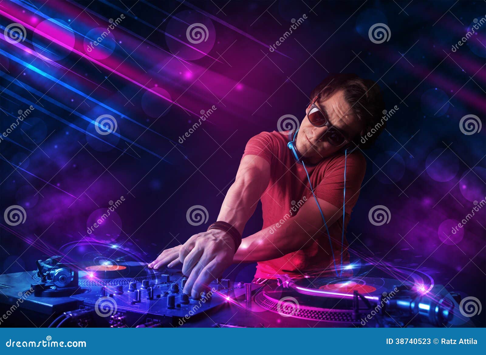 Man Playing on Turntables with Color Light Effects Stock Image - Image ...