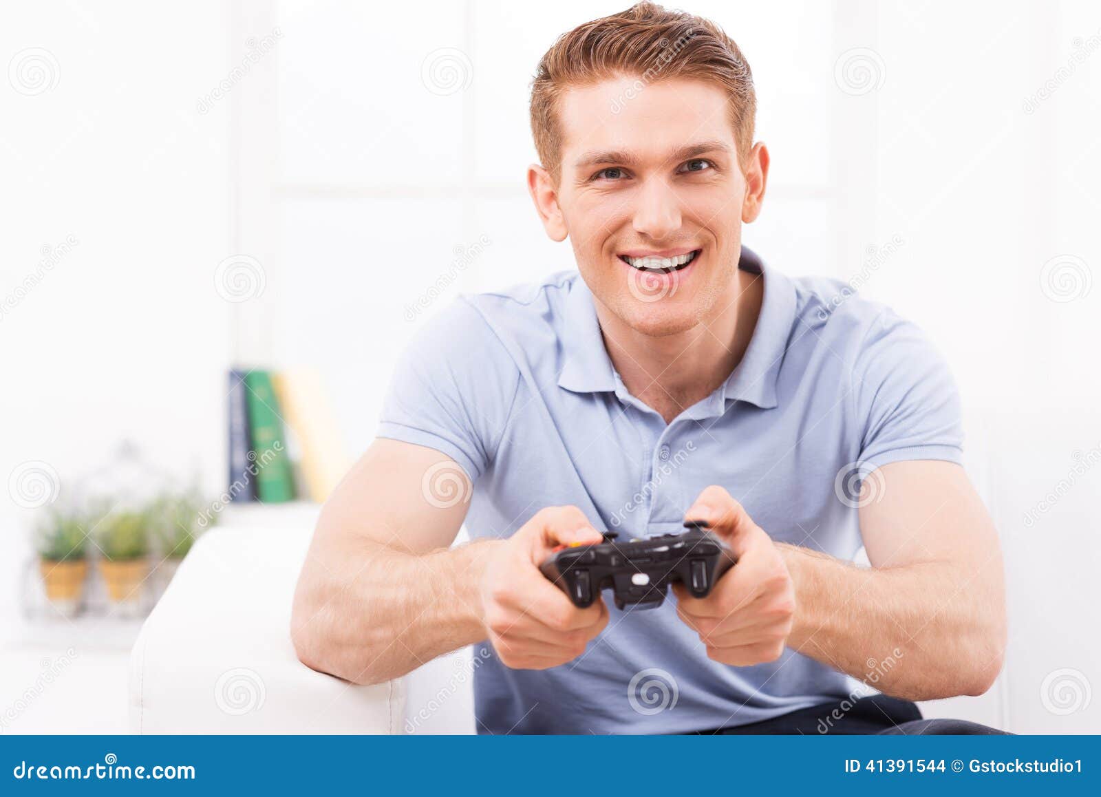 Man playing video game. stock photo. Image of domestic - 41391544