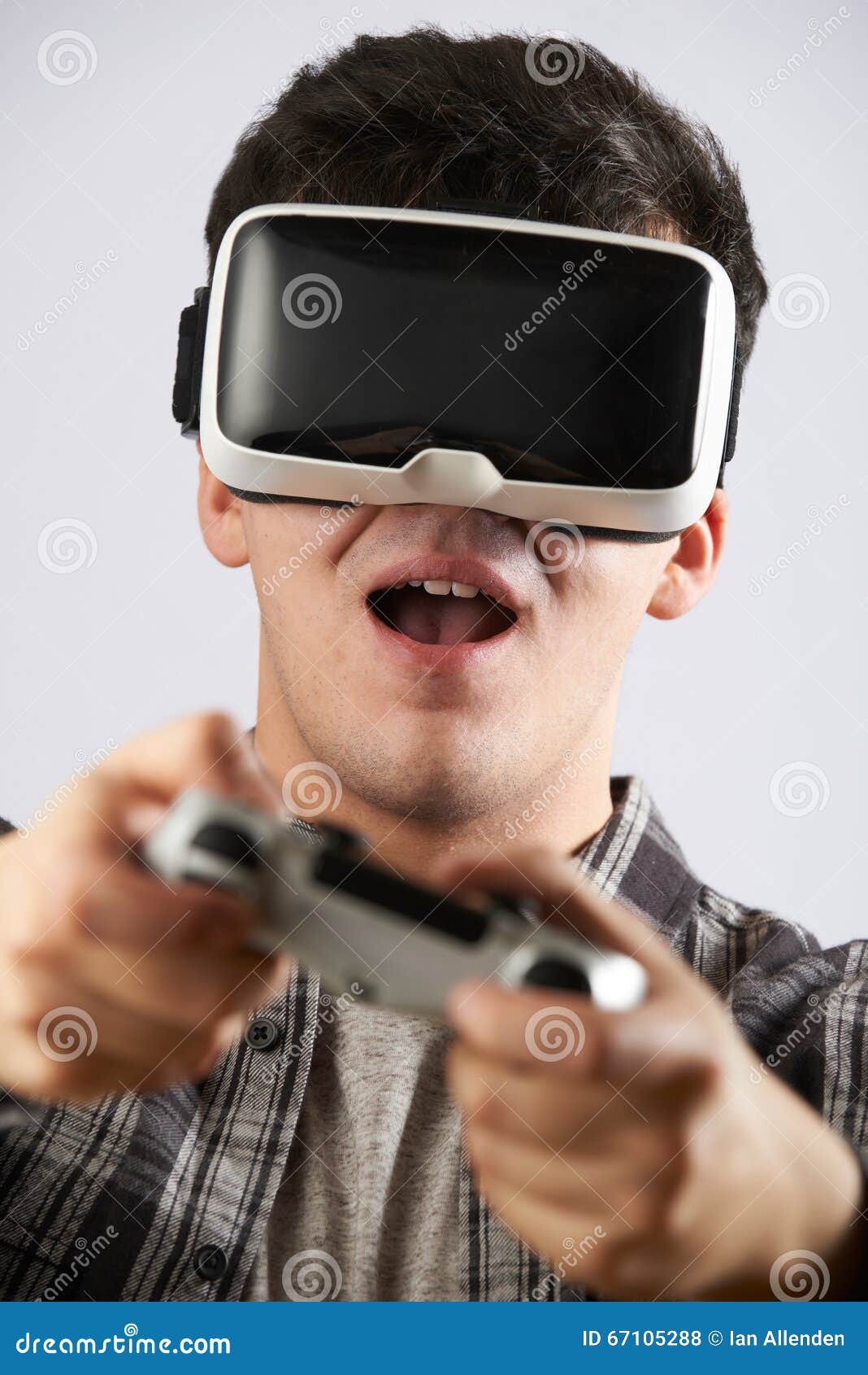 Man Playing Video Game Wearing Virtual Reality Headset Stock Photo ...