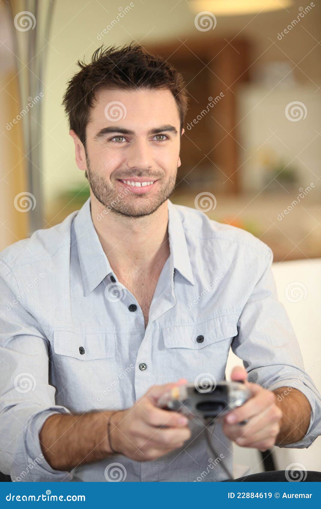 Man playing video games stock image. Image of family - 22884619