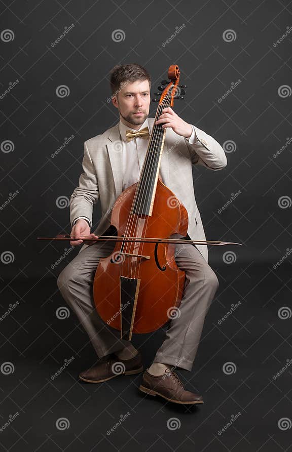 Man Playing the Viola Da Gamba Stock Photo - Image of males, face: 73570648