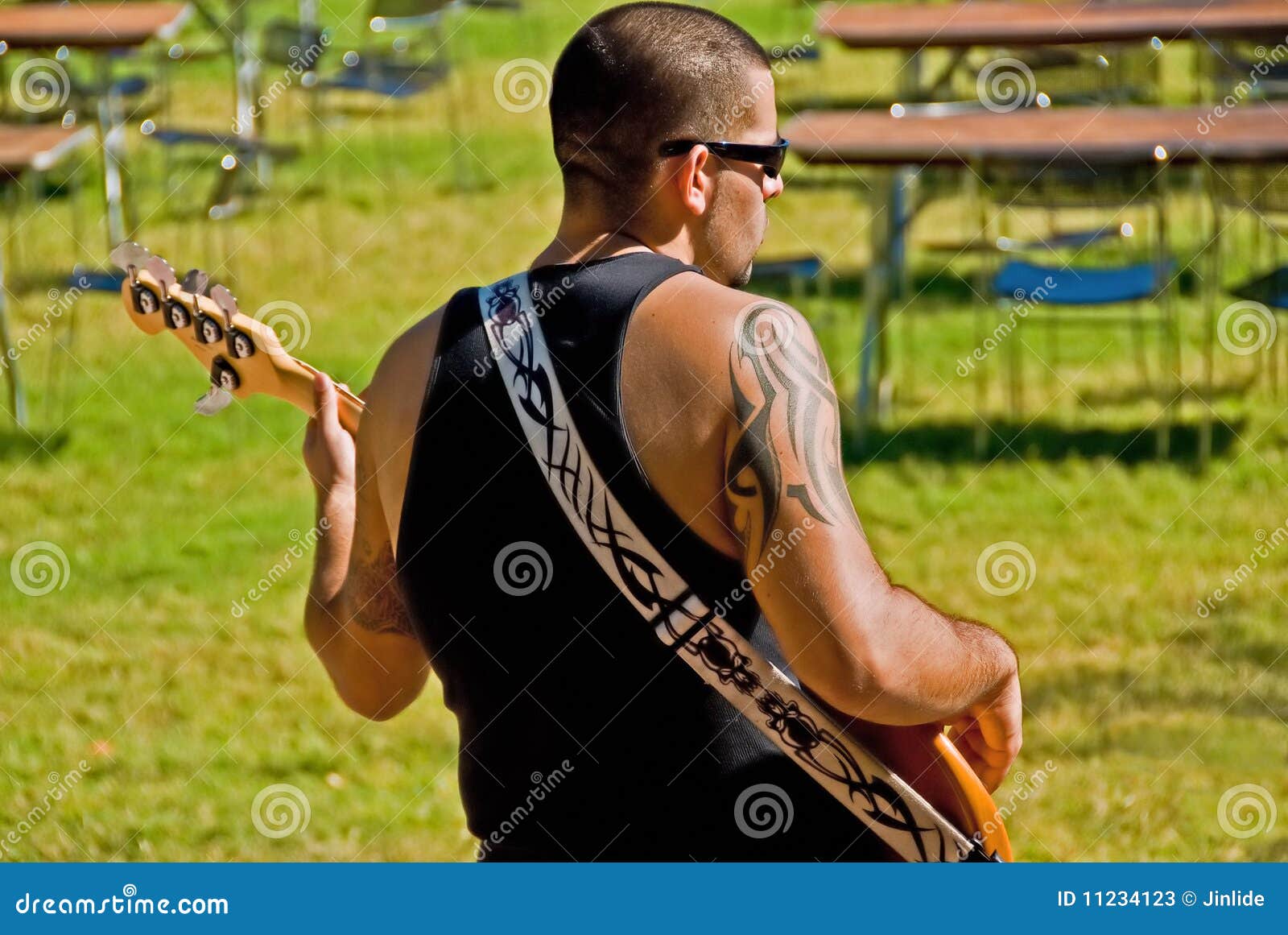 Man Plays Bass Guitar Outdoor Stock Image - Image of table ...