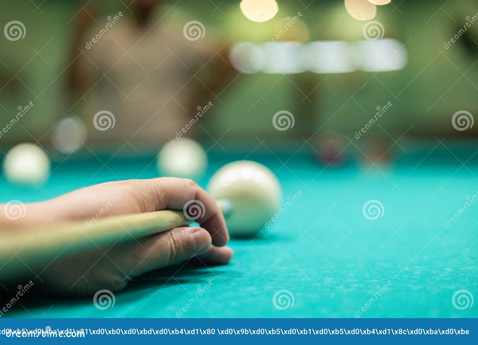 A Man Plays Billiards Effectively and Hits the Ball with a Cue. a ...