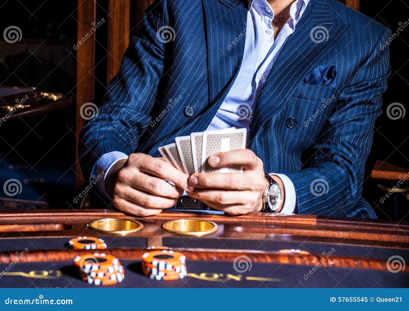 Man plays cards in casino stock image. Image of game - 57655545