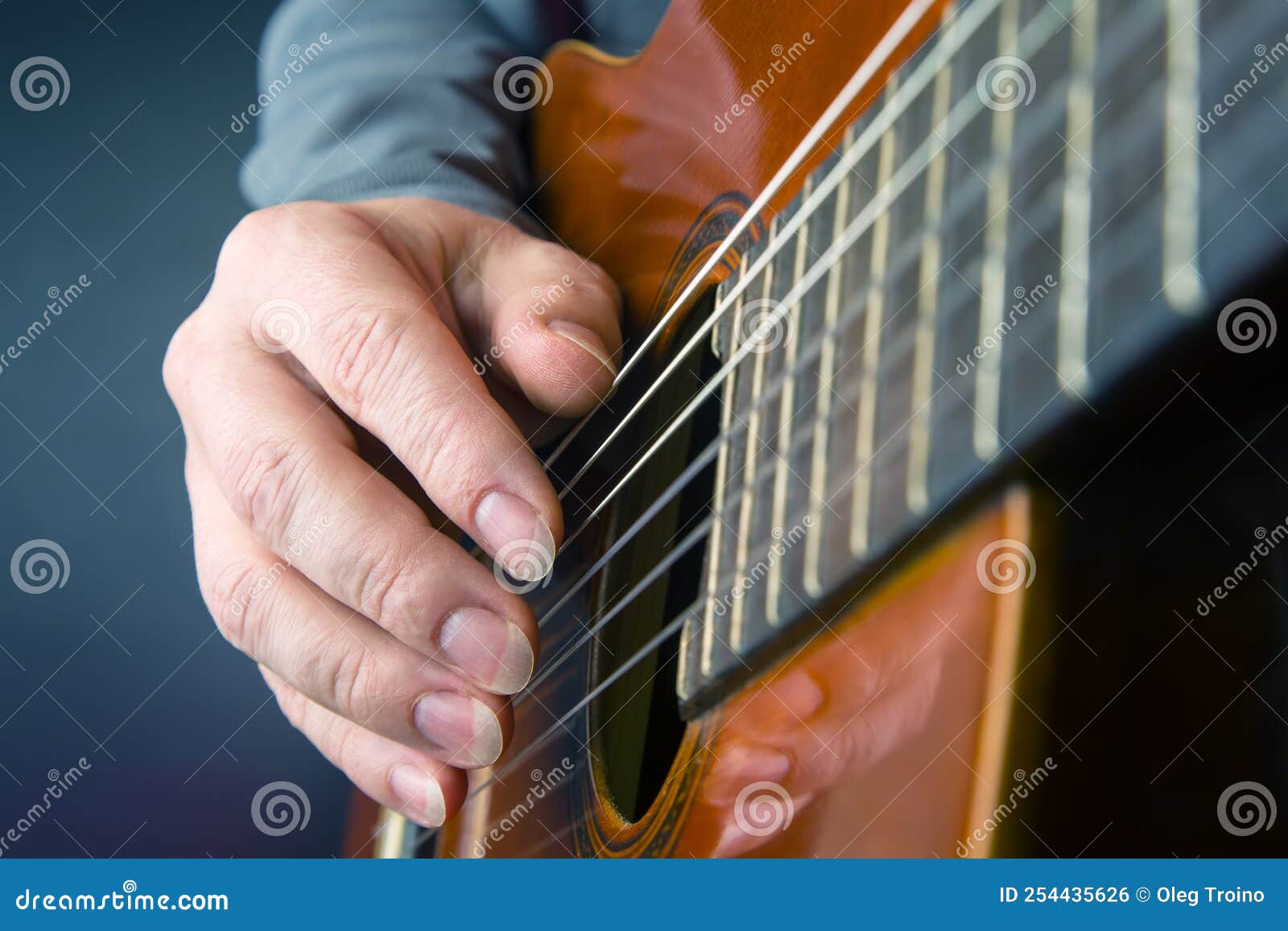 Man Plays the Classical Guitar. String Musical Instrument Stock Photo ...
