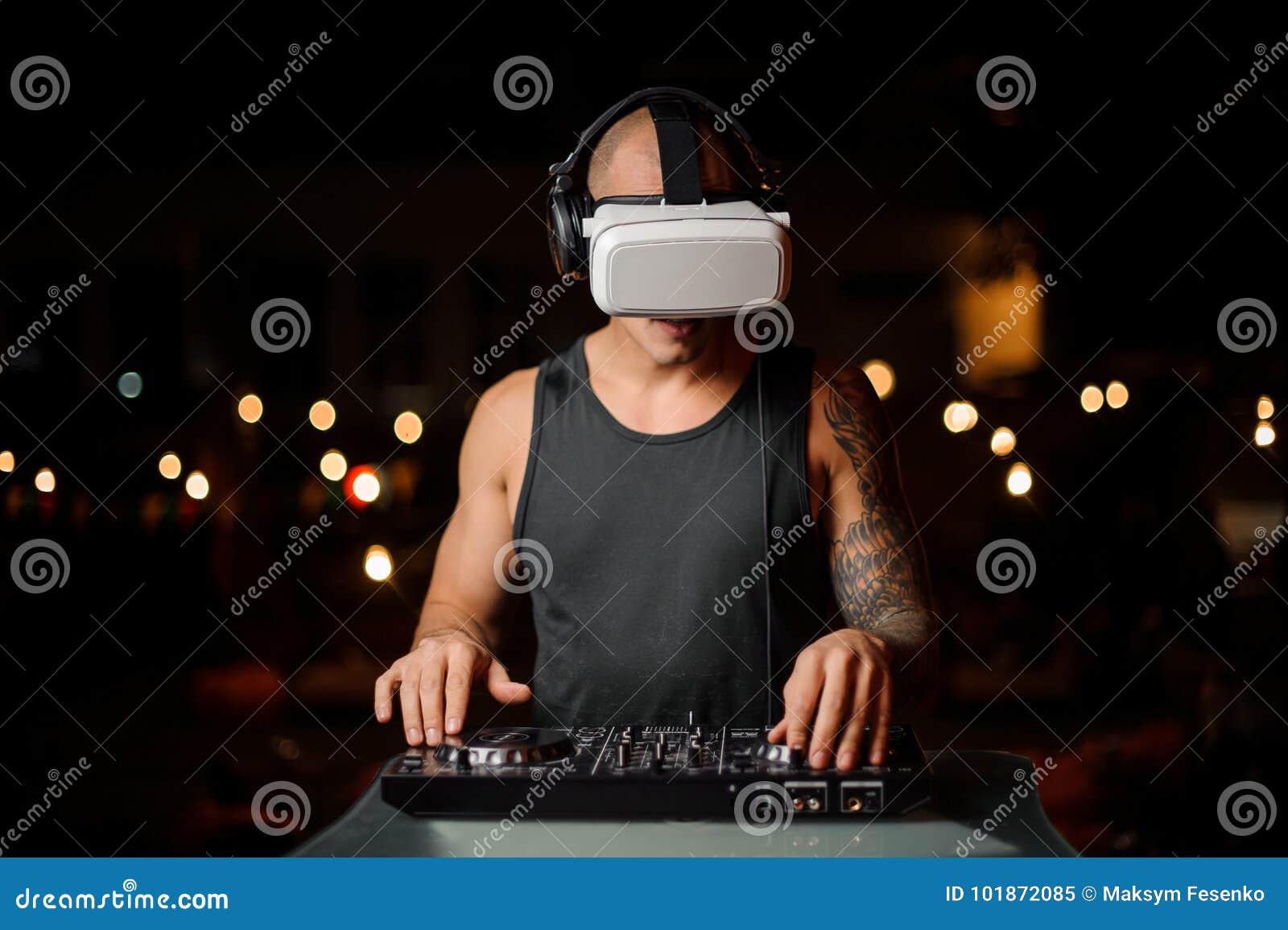 Man Plays a DJ Mixer with Virtual Reality Glasses. Stock Image - Image ...