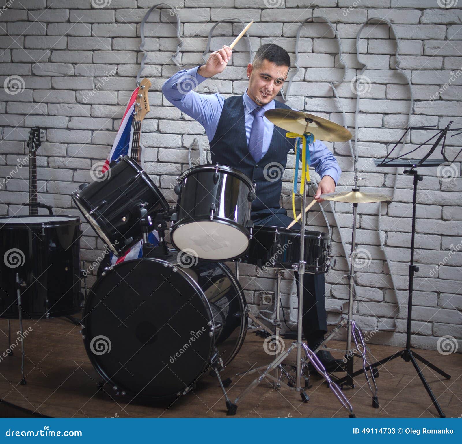 The man plays drums stock image. Image of performance - 49114703