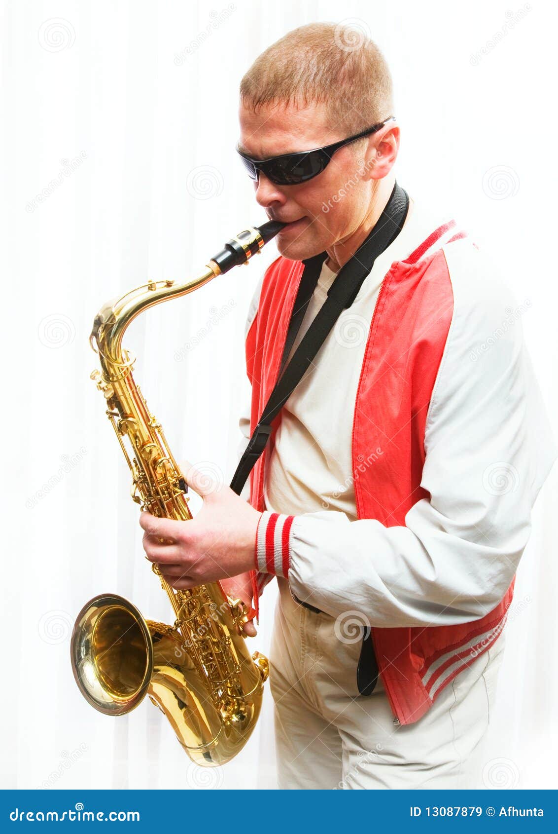 A man plays the saxophone stock image. Image of instrument - 13087879