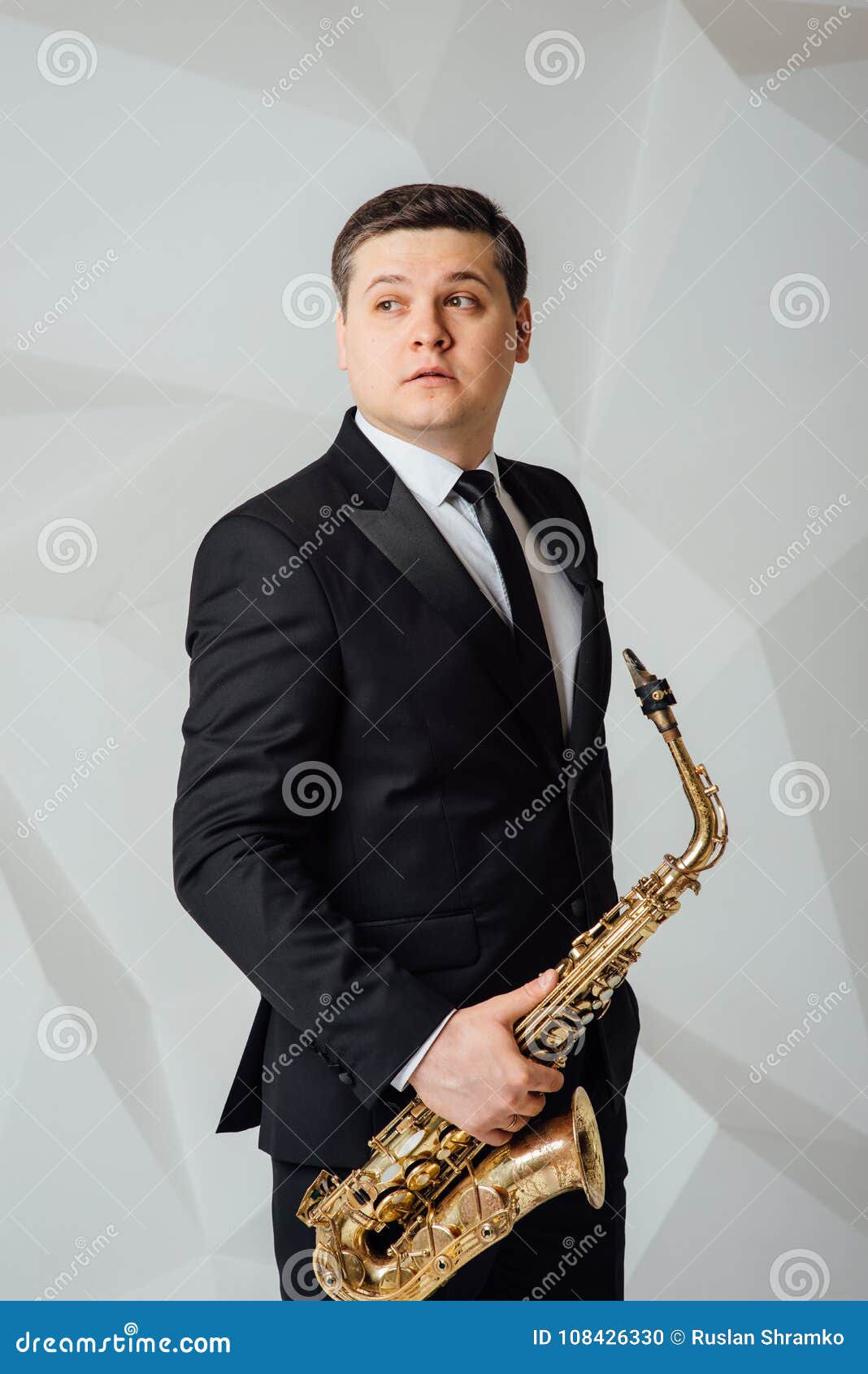 A Man Plays the Saxophone Close Up Stock Photo - Image of melody, gold ...
