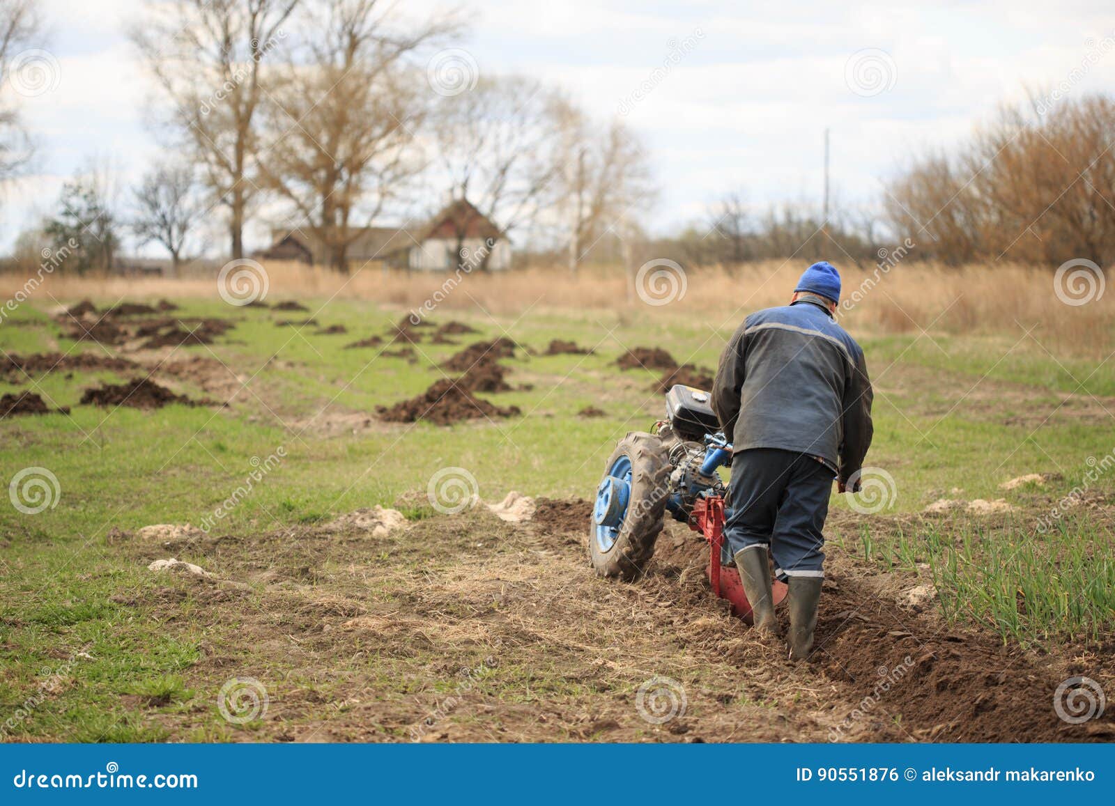 A Man Plows a Field with a Motor-block Stock Photo - Image of nature ...
