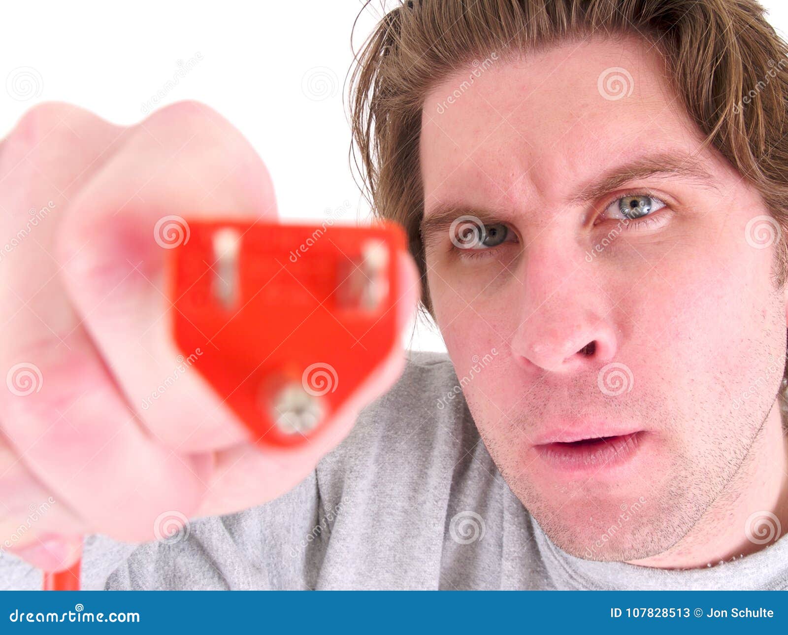 Man Plugging in Orange Plug Stock Image - Image of extension, isolated ...