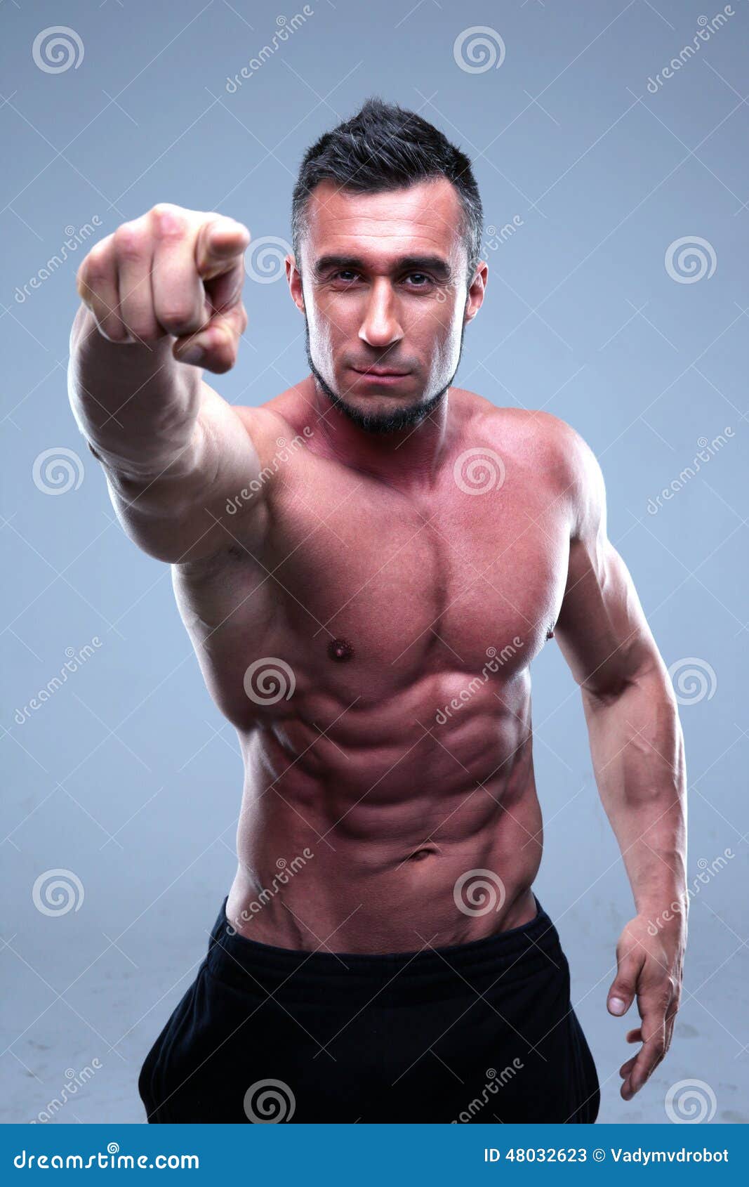 Man pointing at the camera stock image. Image of bodybuilder - 48032623