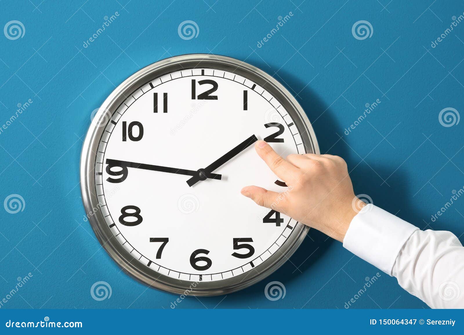 Man Pointing on Clock Against Color Background. Time Management Concept ...