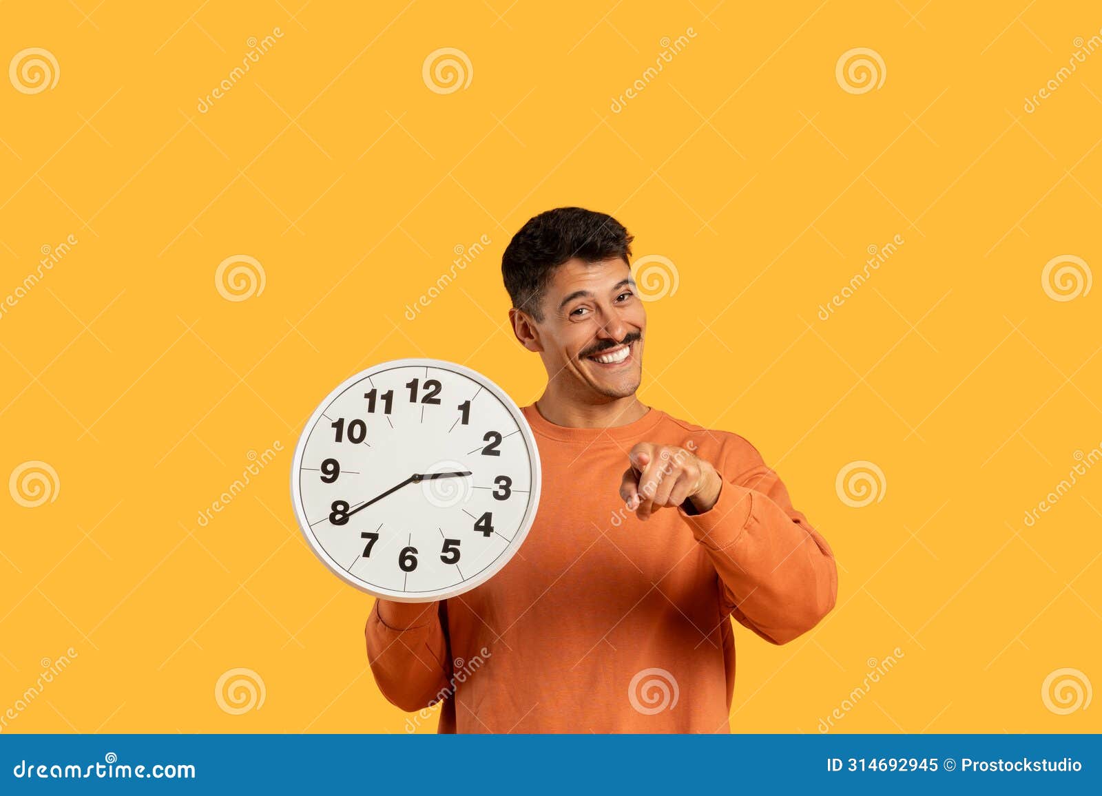 Man Pointing at Clock with Happy Expression Stock Image - Image of male ...