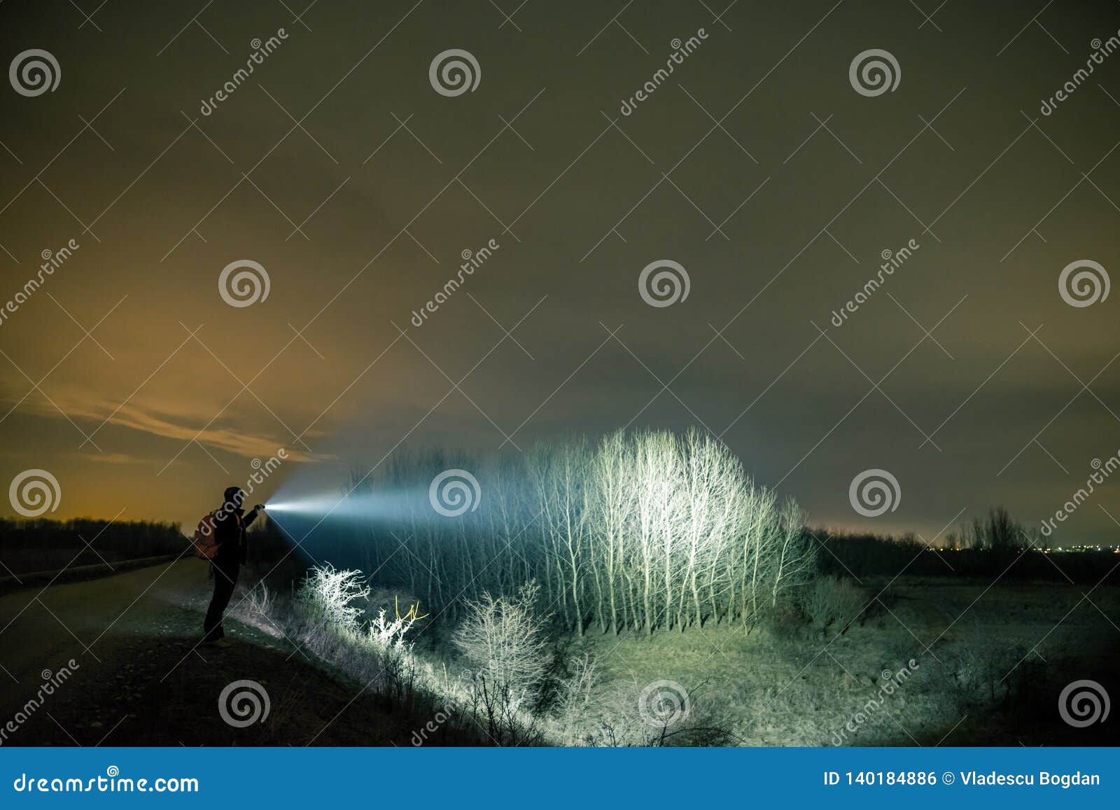 Man with Flashlight in Outdoor at Night Stock Photo - Image of ...