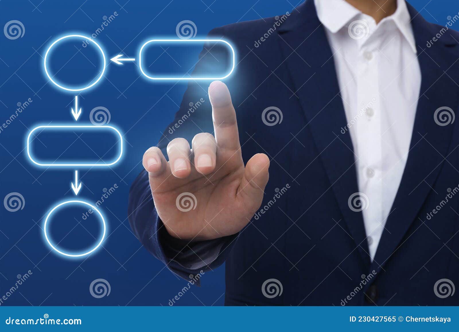 Man Pointing At Flowchart On Virtual Screen Against Dark Blue ...