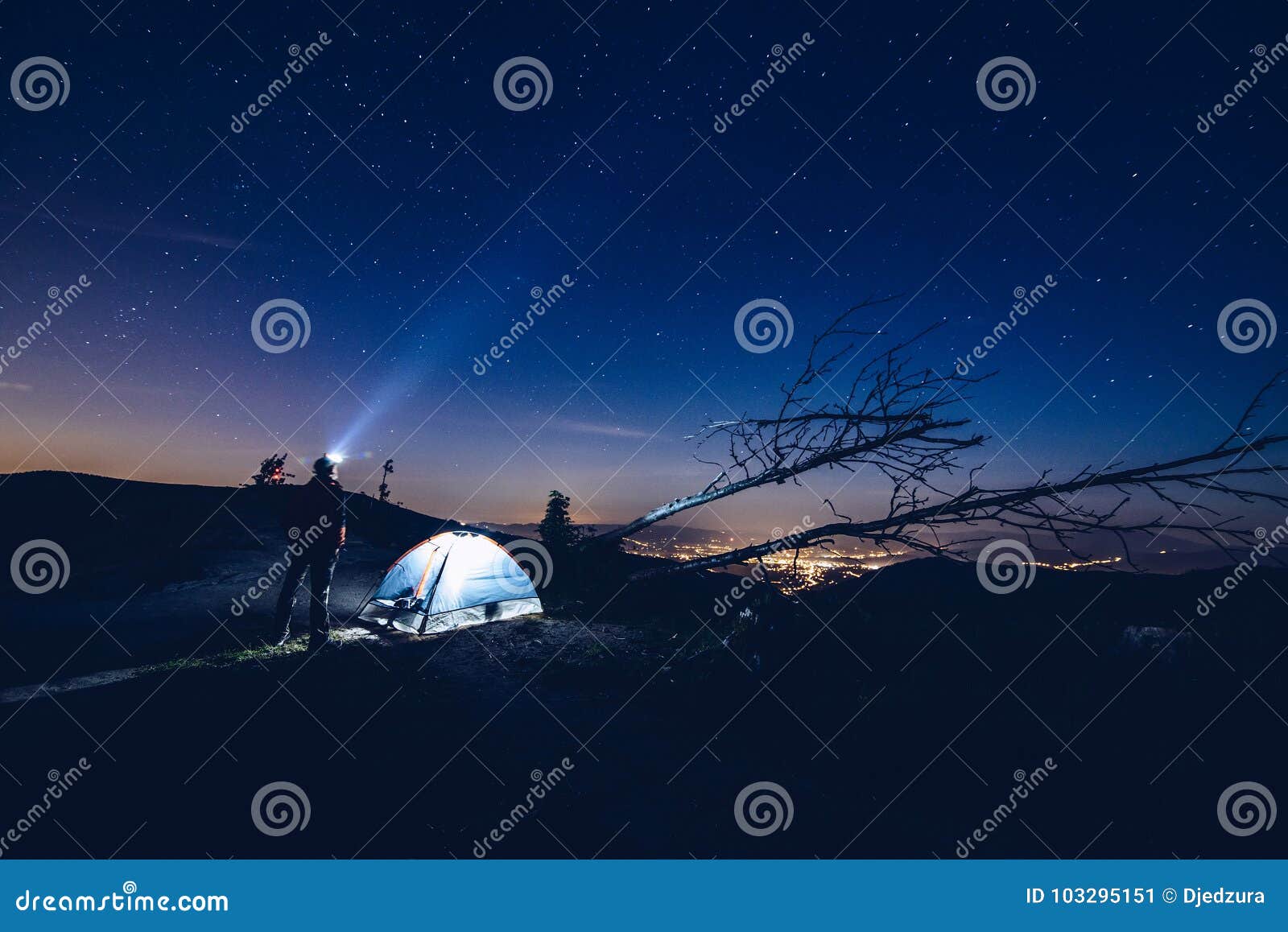 Man Pointing Light from His Flashlight To the Sky. Stock Image - Image ...