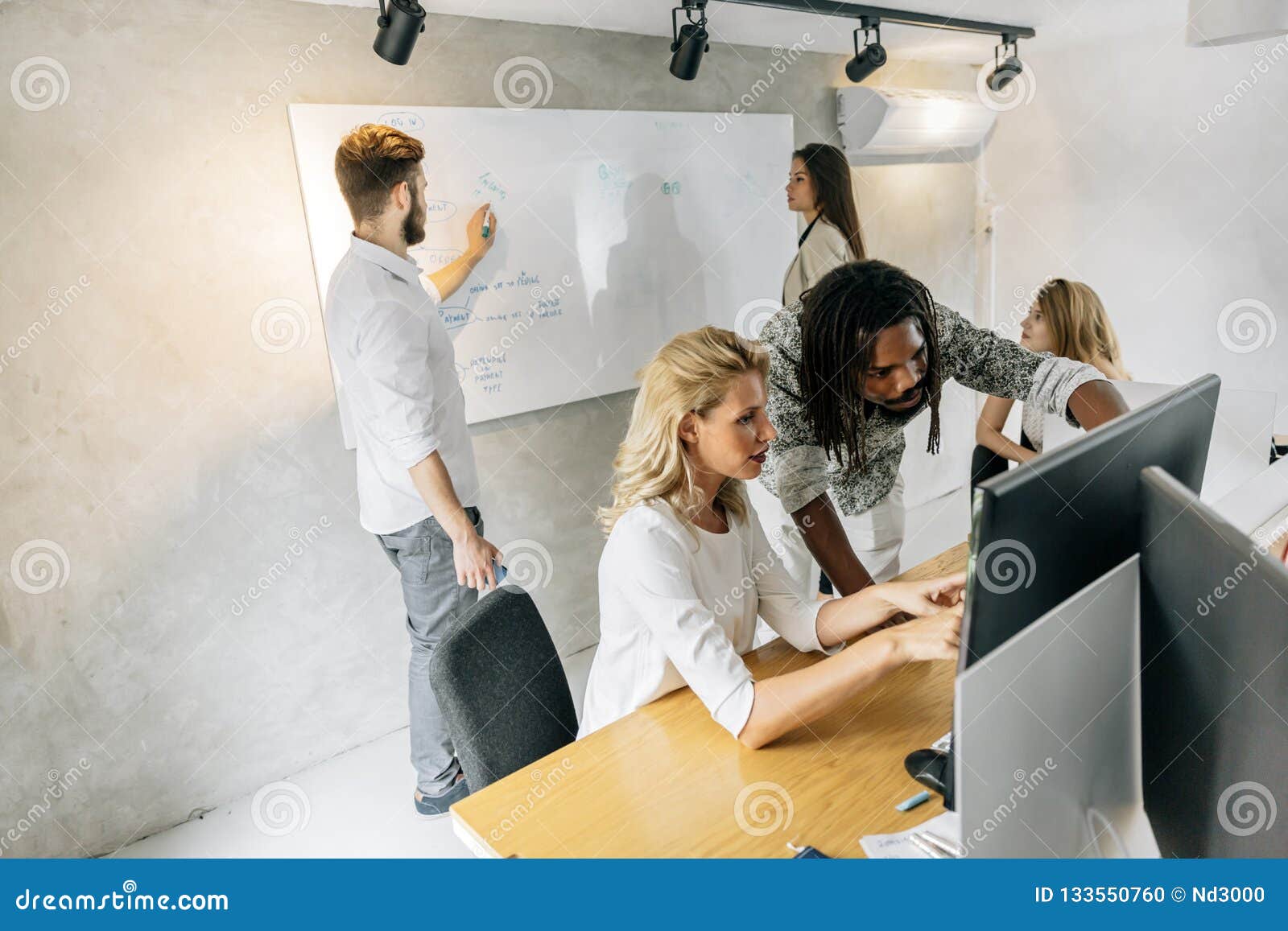Man Pointing at Screen of Desktop Stock Photo - Image of people ...