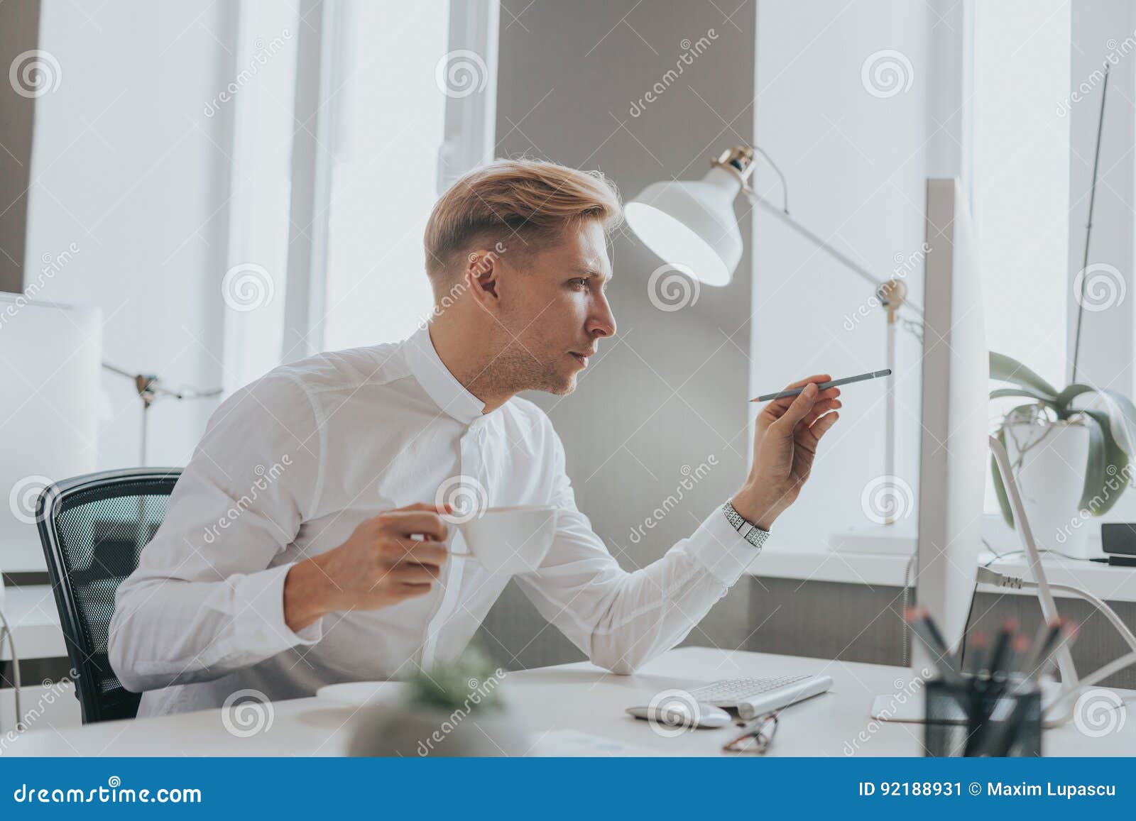 Man Pointing at Screen with Pencil Stock Image - Image of document ...