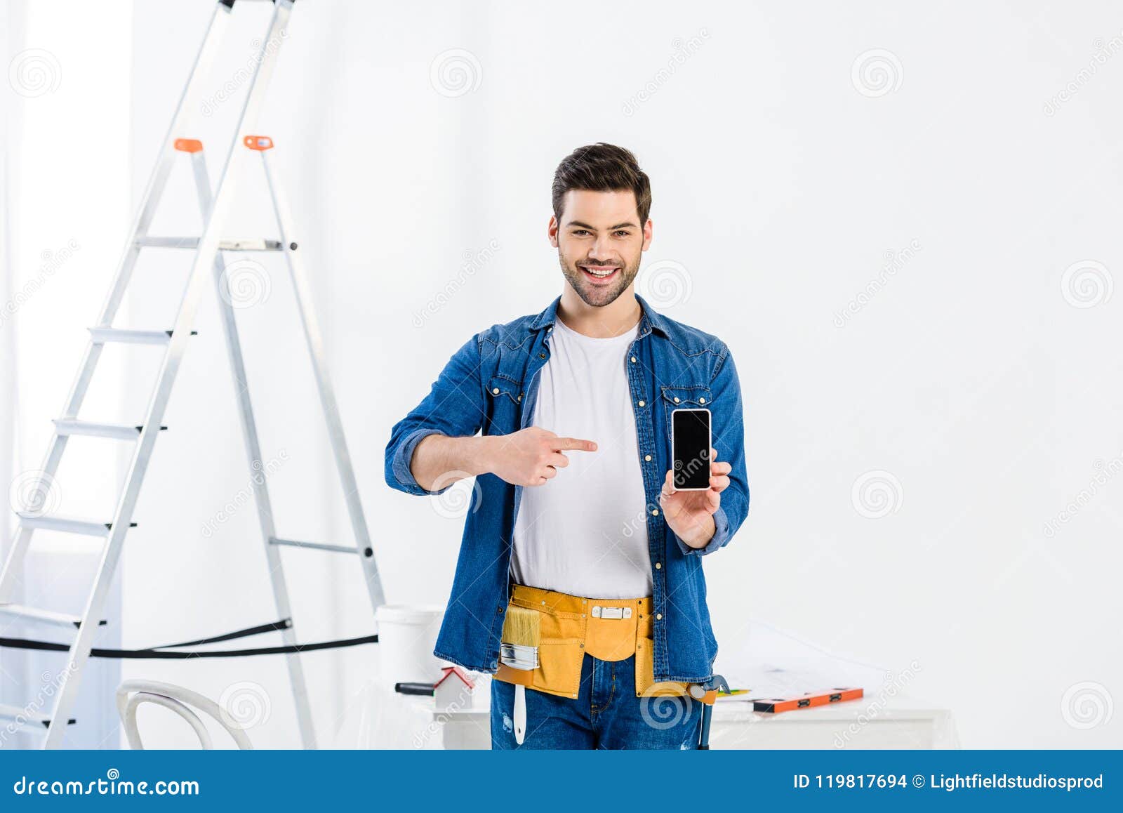 Man Pointing on Smartphone and Looking Stock Photo - Image of camera ...