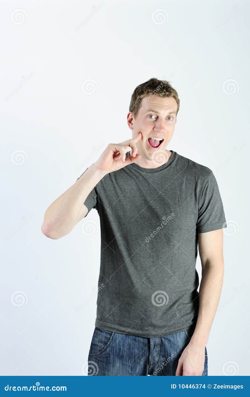 Man Pointing to Cheek stock photo. Image of white, point - 10446374